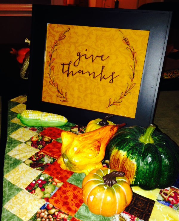 Thanksgiving display with pumpkins and corn. - Sulky