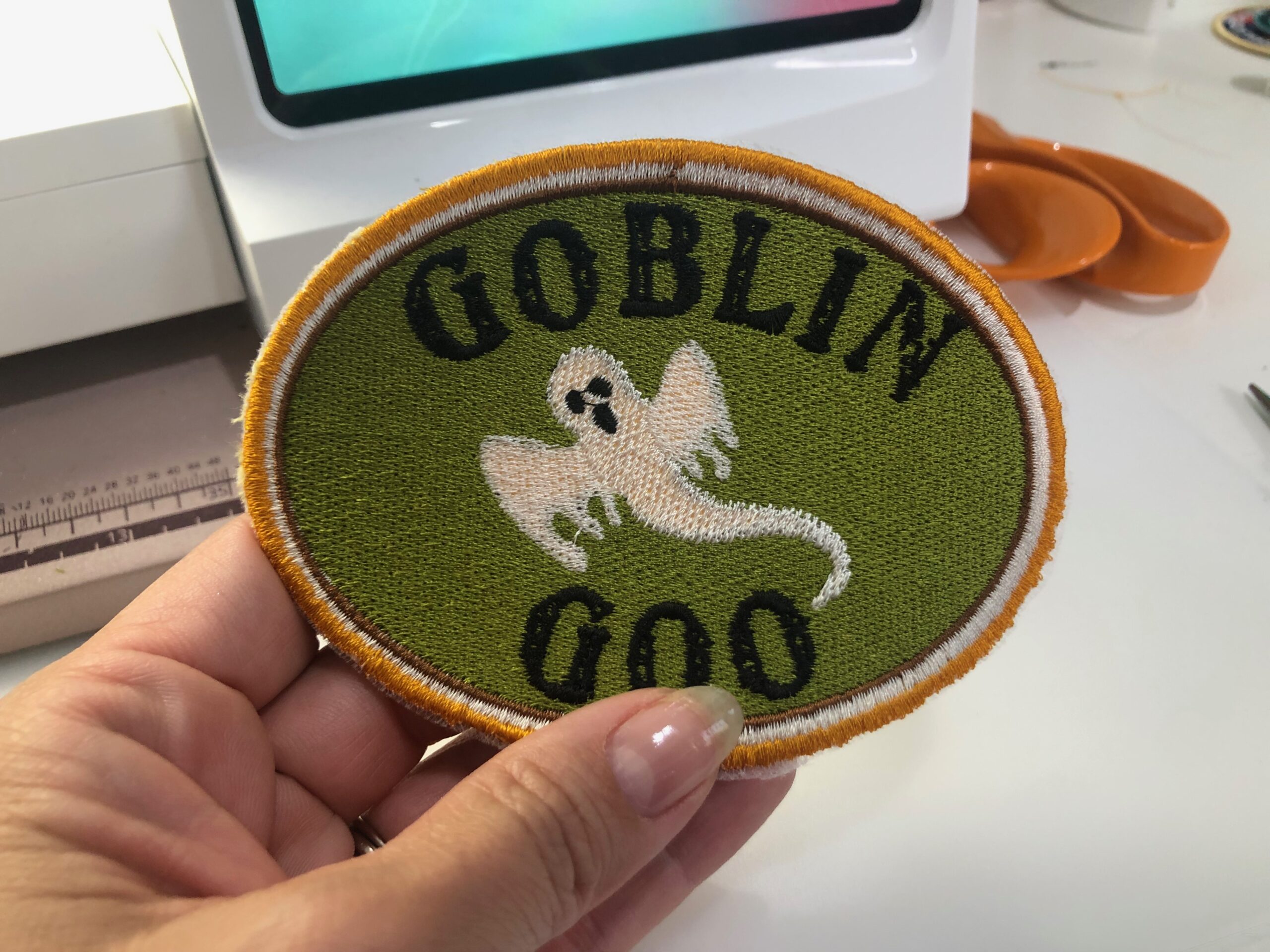 A patch with a ghost and text 'Goblin Goo'. - Sulky