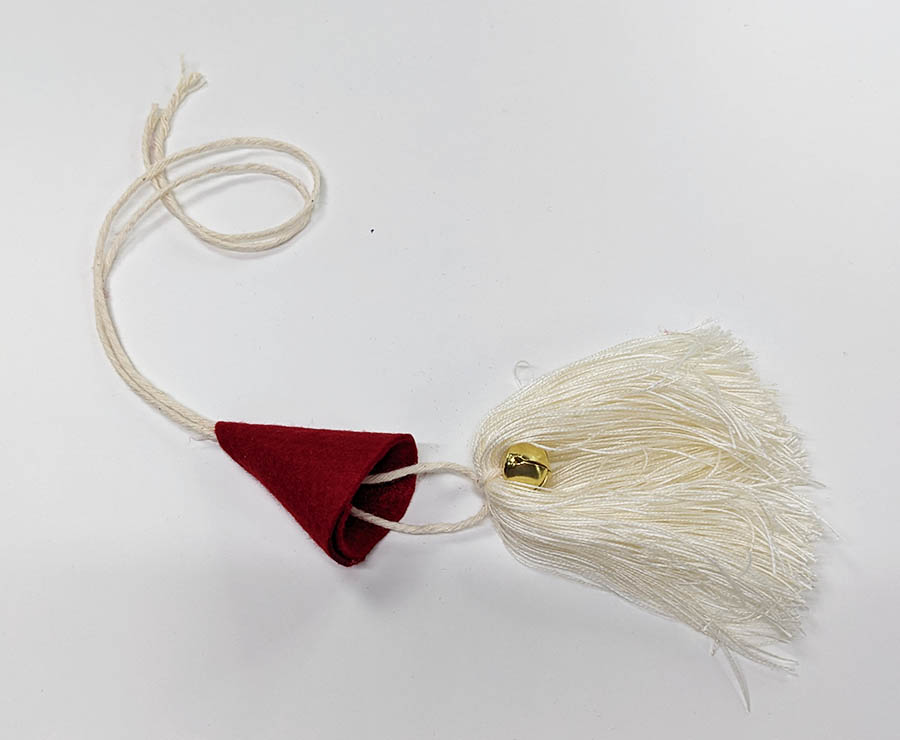 Elegant red tassel with cream fringe and loop. - Sulky