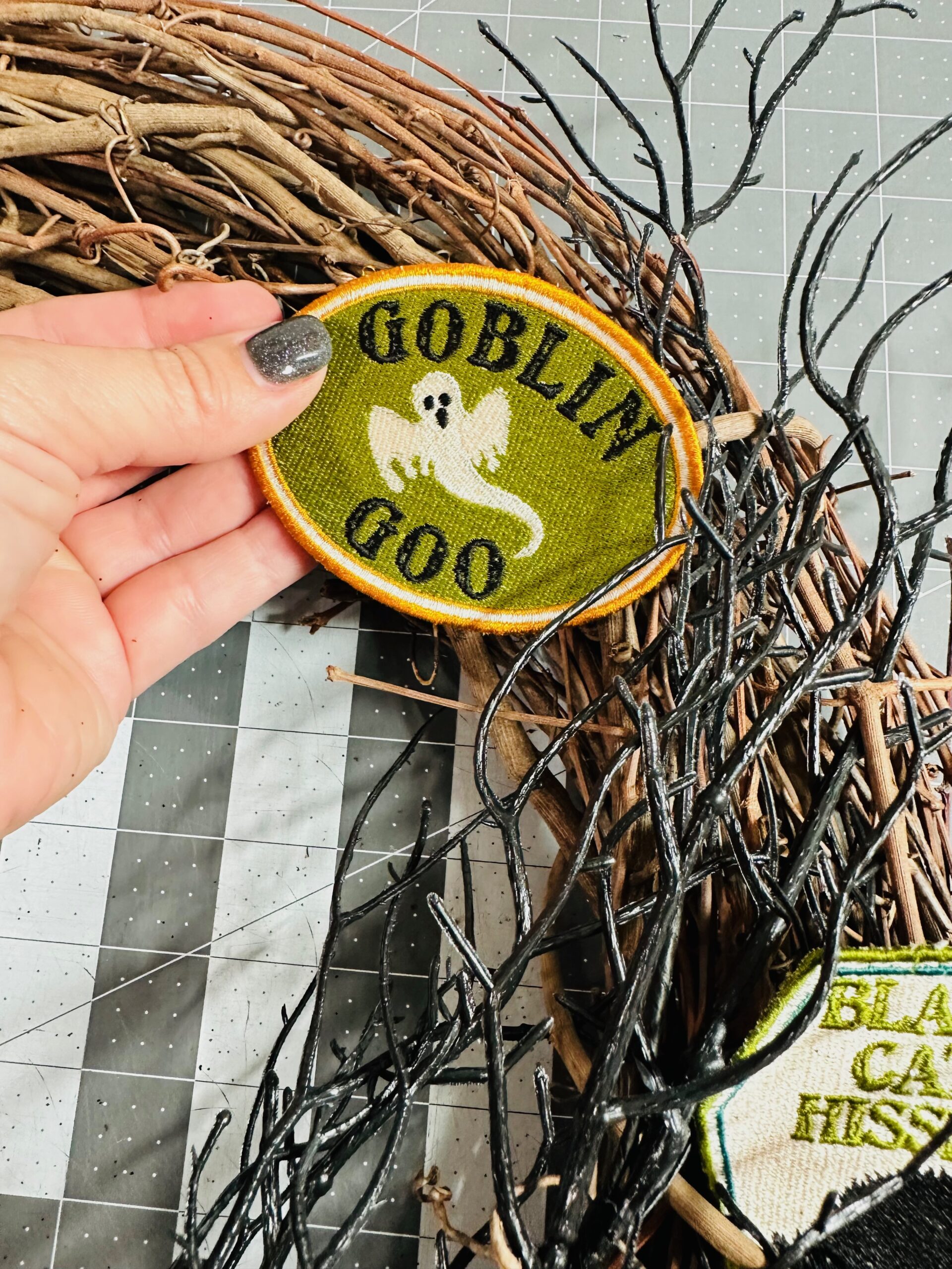 goblin goo halloween patch on wreath - Sulky