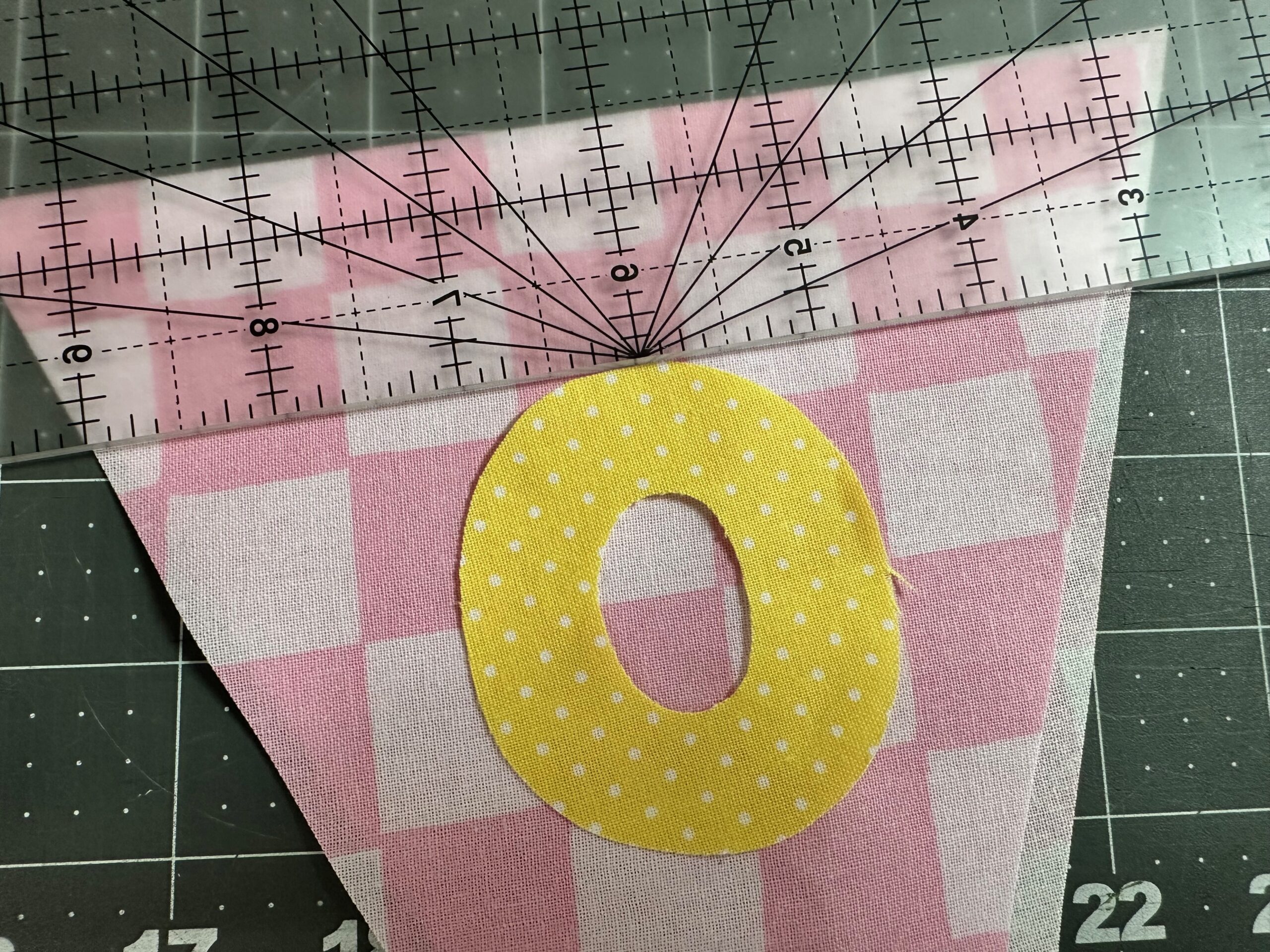 measuring for letter placement on bunting flag - Sulky